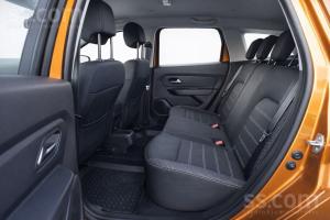 Orange Dacia Duster 2021 in Riga, with an engine capacity of 1.00 L and mileage of 81 thousand km for 10890 €, photo 9 on AUTOMOTO.COM.LV