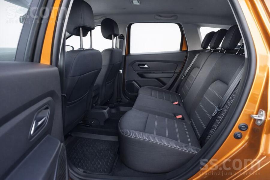 Orange Dacia Duster 2021 in Riga, with an engine capacity of 1.00 L and mileage of 81 thousand km for 10890 €, photo 9 on AUTOMOTO.COM.LV