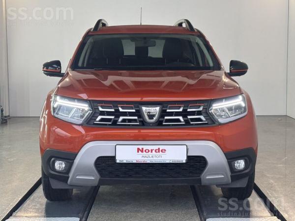 Orange Dacia Duster 2022 in Riga, with an engine capacity of 1.30 L and mileage of 54 thousand km for 14890 €, photo 1 on AUTOMOTO.COM.LV