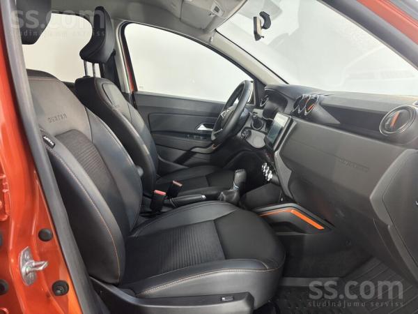 Orange Dacia Duster 2022 in Riga, with an engine capacity of 1.30 L and mileage of 54 thousand km for 14890 €, photo 7 on AUTOMOTO.COM.LV