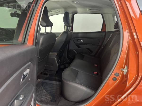 Orange Dacia Duster 2022 in Riga, with an engine capacity of 1.30 L and mileage of 54 thousand km for 14890 €, photo 8 on AUTOMOTO.COM.LV