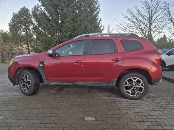 Sarkans Dacia Duster 2021 Panevēža, ar dzinēja tilpumu 1.00 L un nobraukumu 22 tūkst. km par 9300 €, foto 1 vietnē AUTOMOTO.COM.LV