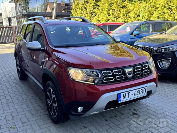 Red Dacia Duster 2021 in Riga, with an engine capacity of 1.00 L and mileage of 166 thousand km for 9200 €, photo 2 on AUTOMOTO.COM.LV