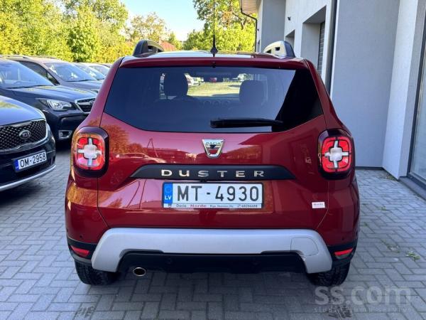 Red Dacia Duster 2021 in Riga, with an engine capacity of 1.00 L and mileage of 166 thousand km for 9200 €, photo 5 on AUTOMOTO.COM.LV