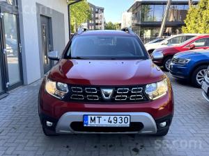 Red Dacia Duster 2021 in Riga, with an engine capacity of 1.00 L and mileage of 166 thousand km for 9200 €, photo 7 on AUTOMOTO.COM.LV
