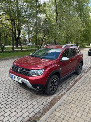 Red Dacia Duster 2021 in Riga, with an engine capacity of 1.00 L and mileage of 165 thousand km for 9500 €, photo  on AUTOMOTO.COM.LV