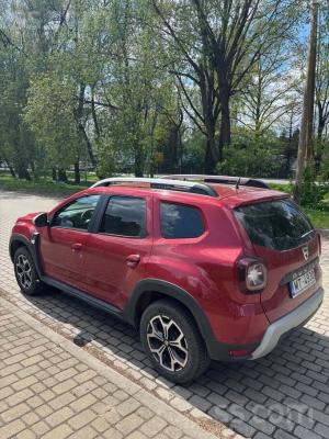 Red Dacia Duster 2021 in Riga, with an engine capacity of 1.00 L and mileage of 165 thousand km for 9500 €, photo 3 on AUTOMOTO.COM.LV