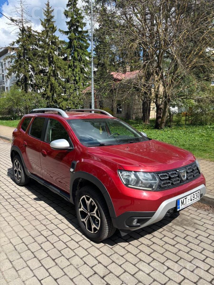 Red Dacia Duster 2021 in Riga, with an engine capacity of 1.00 L and mileage of 165 thousand km for 9500 €, photo 6 on AUTOMOTO.COM.LV