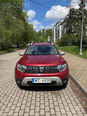 Red Dacia Duster 2021 in Riga, with an engine capacity of 1.00 L and mileage of 165 thousand km for 9500 €, photo 7 on AUTOMOTO.COM.LV