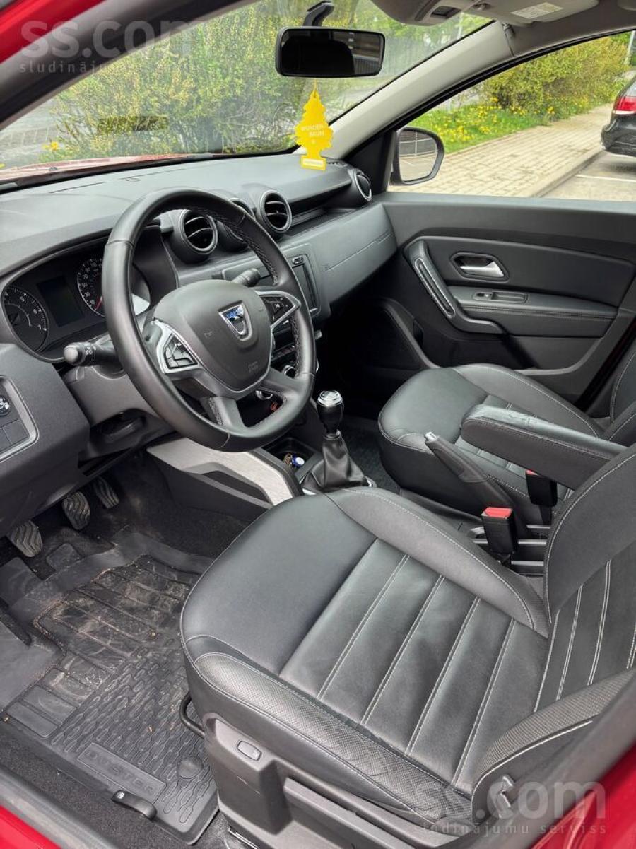 Red Dacia Duster 2021 in Riga, with an engine capacity of 1.00 L and mileage of 165 thousand km for 9500 €, photo 9 on AUTOMOTO.COM.LV