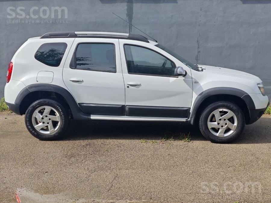 White Dacia Duster 2012 in Ogre, with an engine capacity of 1.50 L and mileage of 156 thousand km for 6750 €, photo 6 on AUTOMOTO.COM.LV