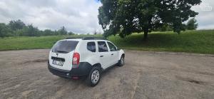 White Dacia Duster 2013 in Kaunas, with an engine capacity of 1.50 L and mileage of 328 thousand km for 4999 €, photo 20 on AUTOMOTO.COM.LV