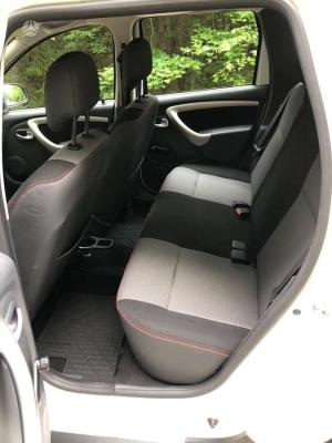 White Dacia Duster 2013 in Marijampole, with an engine capacity of 1.60 L and mileage of 295 thousand km for 4700 €, photo 8 on AUTOMOTO.COM.LV
