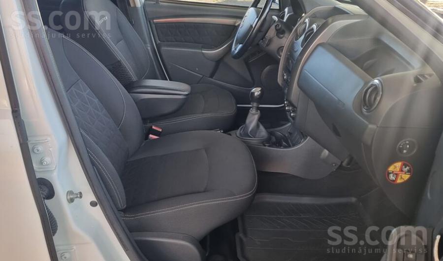 White Dacia Duster 2014 in Riga, with an engine capacity of 1.50 L and mileage of 141 thousand km for 5990 €, photo 14 on AUTOMOTO.COM.LV