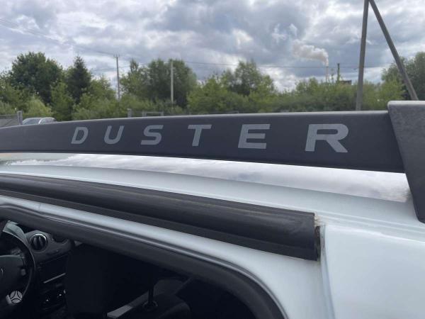 White Dacia Duster 2015 in Radviliskis, with an engine capacity of 1.60 L and mileage of 112 thousand km for 5999 €, photo 9 on AUTOMOTO.COM.LV