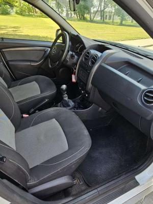 White Dacia Duster 2016 in Taurage, with an engine capacity of 1.46 L and mileage of 129 thousand km for 4800 €, photo 21 on AUTOMOTO.COM.LV