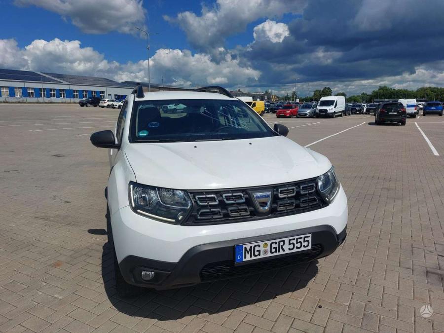 White Dacia Duster 2018 in Taurage, with an engine capacity of 1.60 L and mileage of 86 thousand km for 7900 €, photo 6 on AUTOMOTO.COM.LV