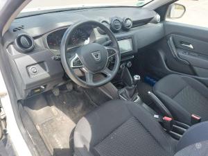 White Dacia Duster 2018 in Taurage, with an engine capacity of 1.60 L and mileage of 86 thousand km for 7900 €, photo 15 on AUTOMOTO.COM.LV