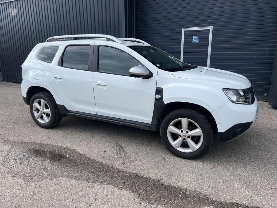White Dacia Duster 2018 in Alytus, with an engine capacity of 1.46 L and mileage of 295 thousand km for 5900 €, photo 4 on AUTOMOTO.COM.LV
