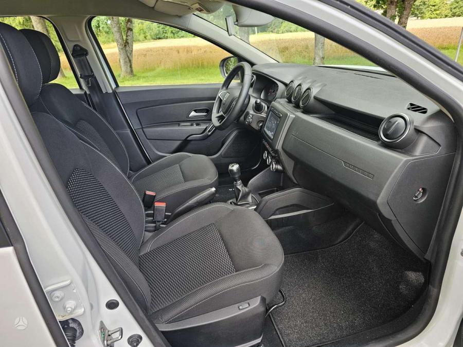 Balts Dacia Duster 2018 Tauragė, ar dzinēja tilpumu 1.60 L un nobraukumu 86 tūkst. km par 7800 €, foto 20 vietnē AUTOMOTO.COM.LV