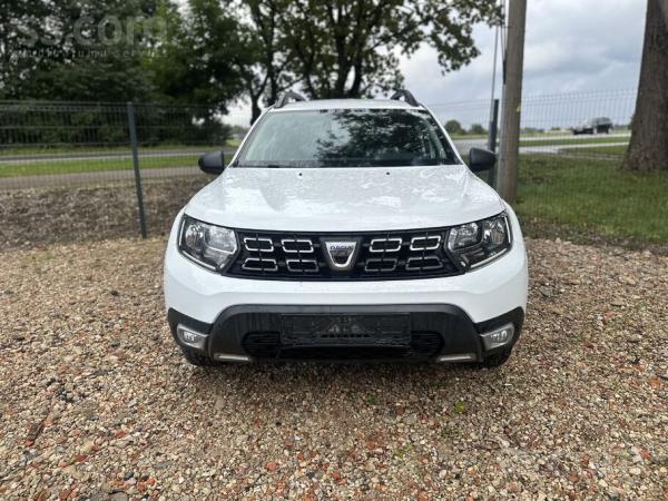 White Dacia Duster 2018 in Cesis, with an engine capacity of 1.20 L and mileage of 0 thousand km for 9900 €, photo 3 on AUTOMOTO.COM.LV