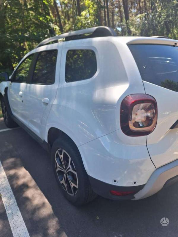 White Dacia Duster 2019 in Siauliai, with an engine capacity of 1.60 L and mileage of 65 thousand km for 9700 €, photo 2 on AUTOMOTO.COM.LV