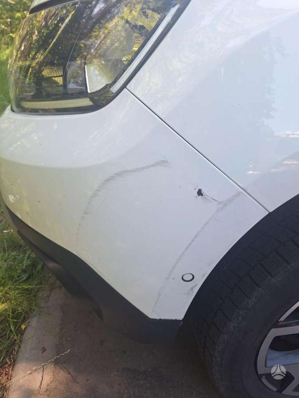 White Dacia Duster 2019 in Siauliai, with an engine capacity of 1.60 L and mileage of 65 thousand km for 9700 €, photo 5 on AUTOMOTO.COM.LV