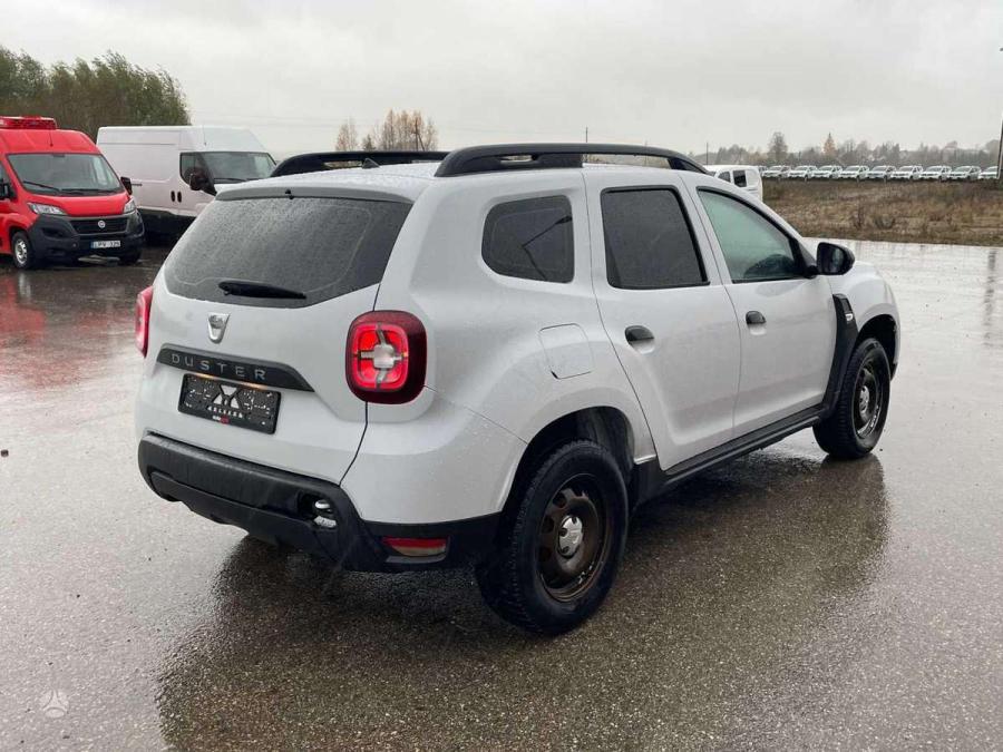 White Dacia Duster 2021 in Ukmerge, with an engine capacity of 1.00 L and mileage of 93 thousand km for 6900 €, photo 3 on AUTOMOTO.COM.LV