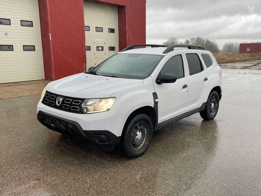 White Dacia Duster 2021 in Ukmerge, with an engine capacity of 1.00 L and mileage of 93 thousand km for 6900 €, photo 1 on AUTOMOTO.COM.LV