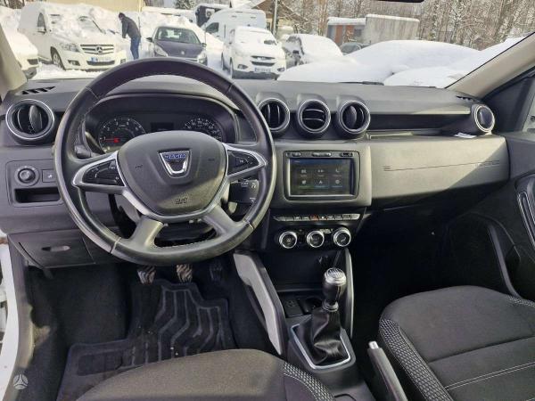 White Dacia Duster 2021 in Taurage, with an engine capacity of 1.46 L and mileage of 280 thousand km for 9700 €, photo 11 on AUTOMOTO.COM.LV