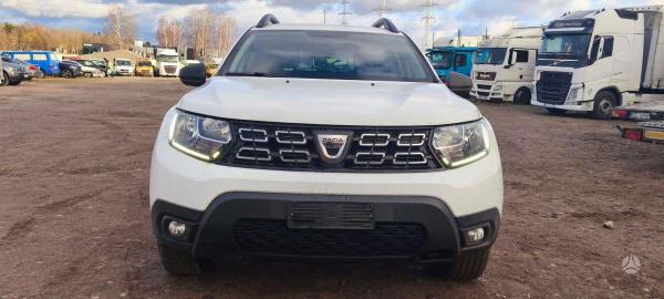 White Dacia Duster 2021 in Kaunas, with an engine capacity of 1.46 L and mileage of 130 thousand km for 13673 €, photo 3 on AUTOMOTO.COM.LV