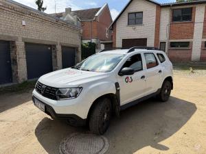 White Dacia Duster 2021 in Alytus, with an engine capacity of 1.00 L and mileage of 228 thousand km for 4400 €, photo 3 on AUTOMOTO.COM.LV