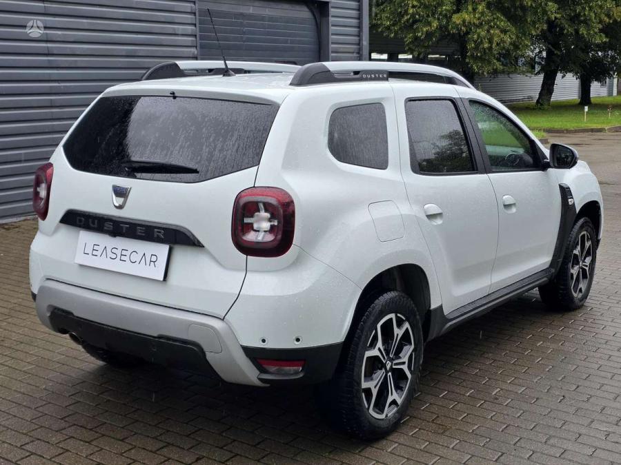 White Dacia Duster 2021 in Vilnius, with an engine capacity of 1.46 L and mileage of 129 thousand km for 13750 €, photo 5 on AUTOMOTO.COM.LV