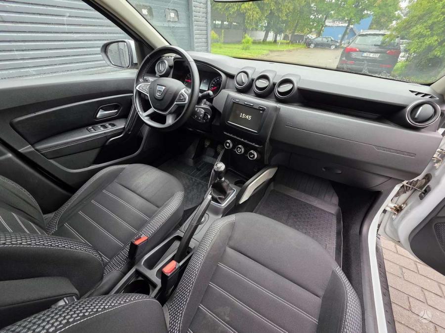 White Dacia Duster 2021 in Vilnius, with an engine capacity of 1.46 L and mileage of 129 thousand km for 13750 €, photo 11 on AUTOMOTO.COM.LV