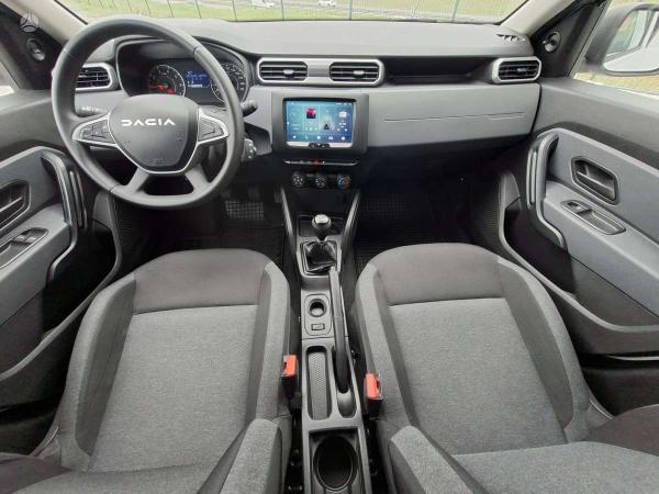 White Dacia Duster 2023 in Vilnius, with an engine capacity of 1.00 L and mileage of 51 thousand km for 11400 €, photo 9 on AUTOMOTO.COM.LV