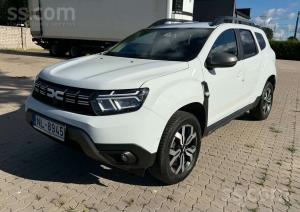 White Dacia Duster 2023 in Liepaja, with an engine capacity of 1.50 L and mileage of 91 thousand km for 16577 €, photo  on AUTOMOTO.COM.LV