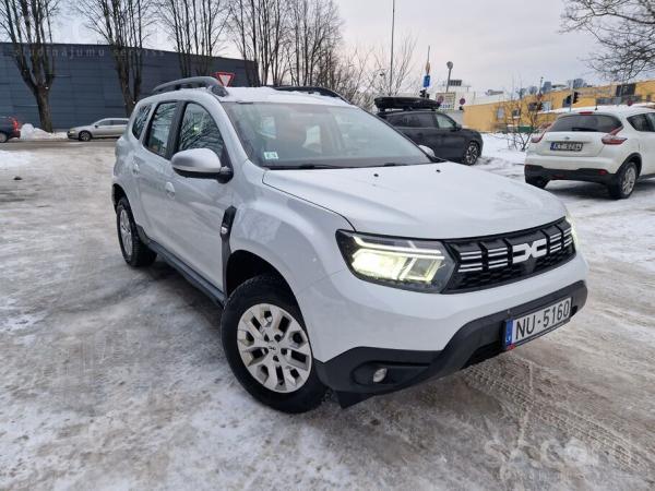 White Dacia Duster 2024 in Riga, with an engine capacity of 1.00 L and mileage of 47 thousand km for 15700 €, photo 2 on AUTOMOTO.COM.LV