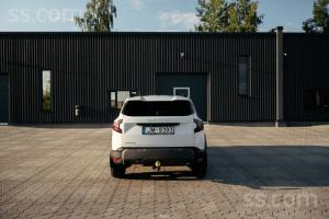 White Dacia Duster 2024 in Riga, with an engine capacity of 1.00 L and mileage of 70 thousand km for 16490 €, photo 7 on AUTOMOTO.COM.LV