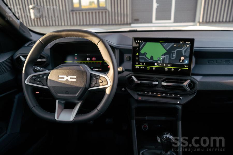 White Dacia Duster 2024 in Riga, with an engine capacity of 1.00 L and mileage of 70 thousand km for 16490 €, photo 9 on AUTOMOTO.COM.LV