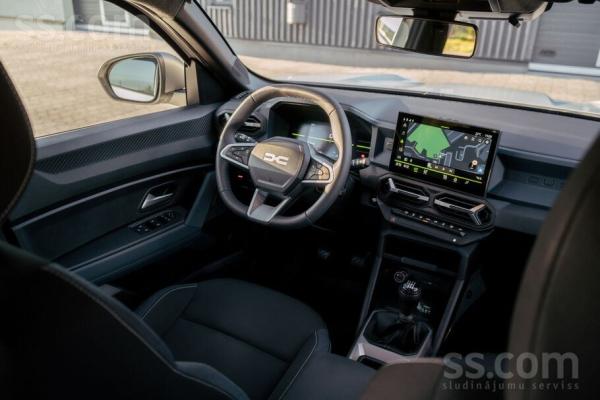 White Dacia Duster 2024 in Riga, with an engine capacity of 1.00 L and mileage of 70 thousand km for 16490 €, photo 10 on AUTOMOTO.COM.LV