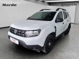 White Dacia Duster 2021 in Riga, with an engine capacity of 1.00 L and mileage of 129 thousand km for 8490 €, photo  on AUTOMOTO.COM.LV