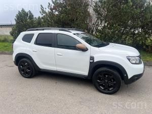 White Dacia Duster 2023 in Riga, with an engine capacity of 1.00 L and mileage of 42 thousand km for 14200 €, photo  on AUTOMOTO.COM.LV
