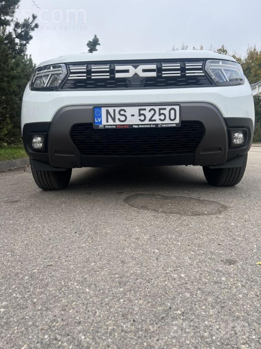 White Dacia Duster 2023 in Riga, with an engine capacity of 1.00 L and mileage of 42 thousand km for 14200 €, photo 6 on AUTOMOTO.COM.LV