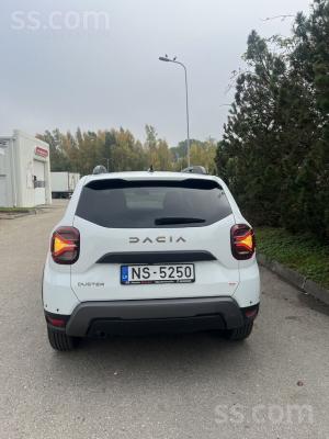 White Dacia Duster 2023 in Riga, with an engine capacity of 1.00 L and mileage of 42 thousand km for 14200 €, photo 8 on AUTOMOTO.COM.LV