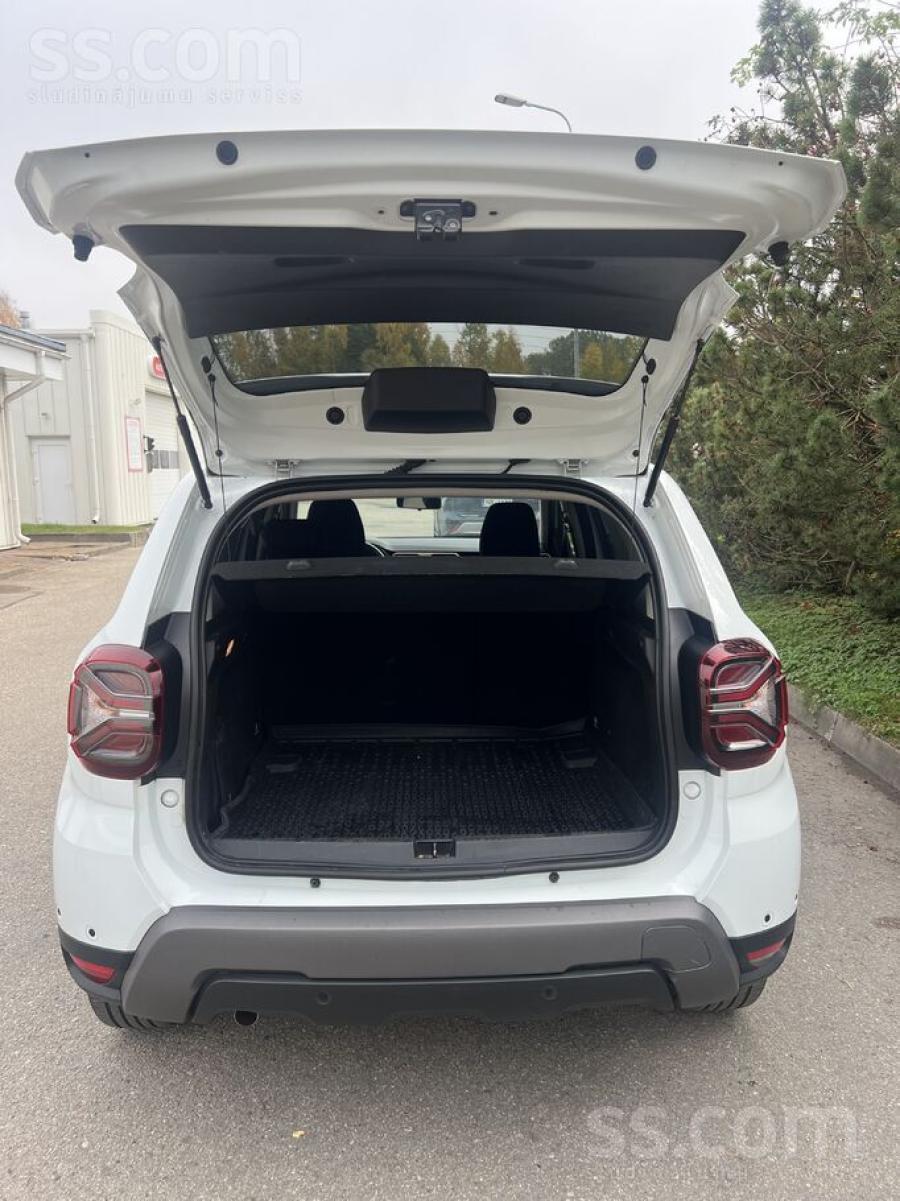 White Dacia Duster 2023 in Riga, with an engine capacity of 1.00 L and mileage of 42 thousand km for 14200 €, photo 10 on AUTOMOTO.COM.LV