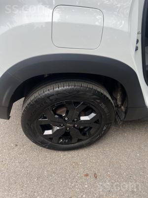 White Dacia Duster 2023 in Riga, with an engine capacity of 1.00 L and mileage of 42 thousand km for 14200 €, photo 14 on AUTOMOTO.COM.LV