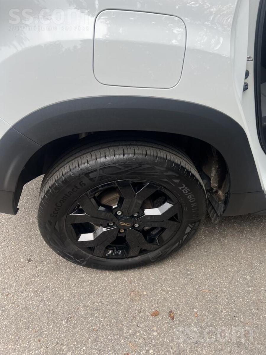 White Dacia Duster 2023 in Riga, with an engine capacity of 1.00 L and mileage of 42 thousand km for 14200 €, photo 14 on AUTOMOTO.COM.LV