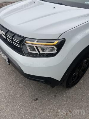 White Dacia Duster 2023 in Riga, with an engine capacity of 1.00 L and mileage of 42 thousand km for 14200 €, photo 22 on AUTOMOTO.COM.LV