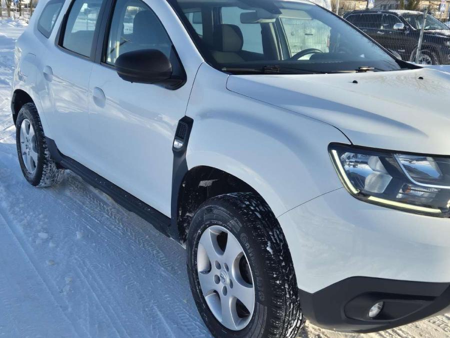 White Dacia Duster 2018 in Siauliai, with an engine capacity of 1.20 L and mileage of 122 thousand km for 8450 €, photo 4 on AUTOMOTO.COM.LV