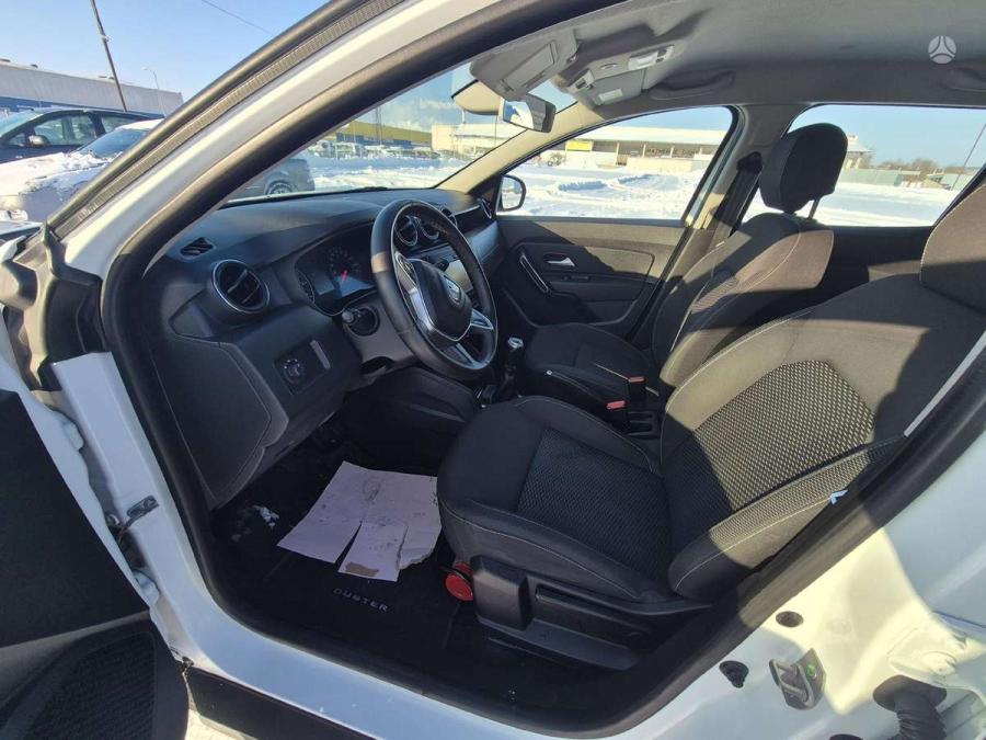 White Dacia Duster 2018 in Siauliai, with an engine capacity of 1.20 L and mileage of 122 thousand km for 8450 €, photo 14 on AUTOMOTO.COM.LV